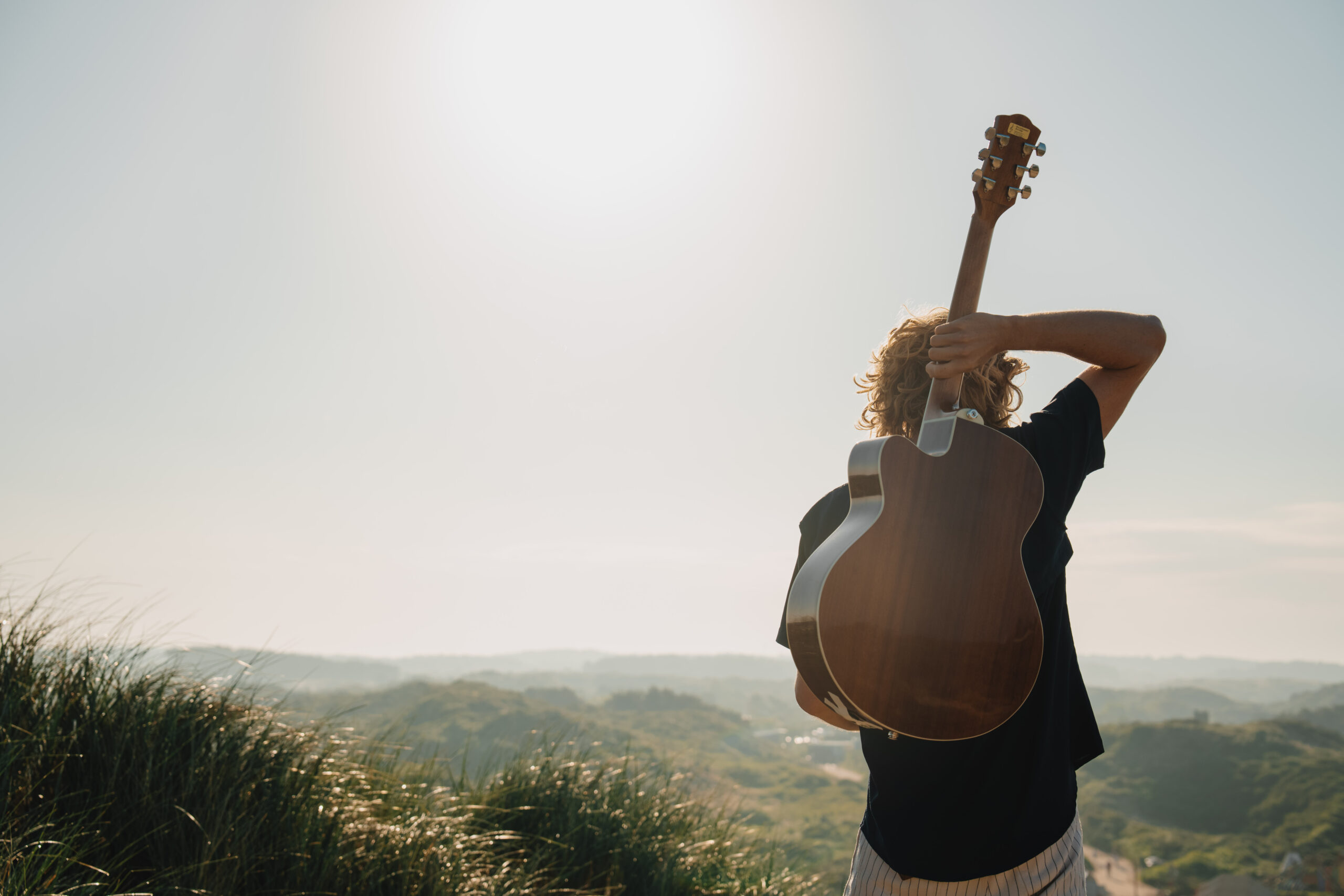 Pat Mogge combineert muziek met vragen des levens - indebuurt Haarlem