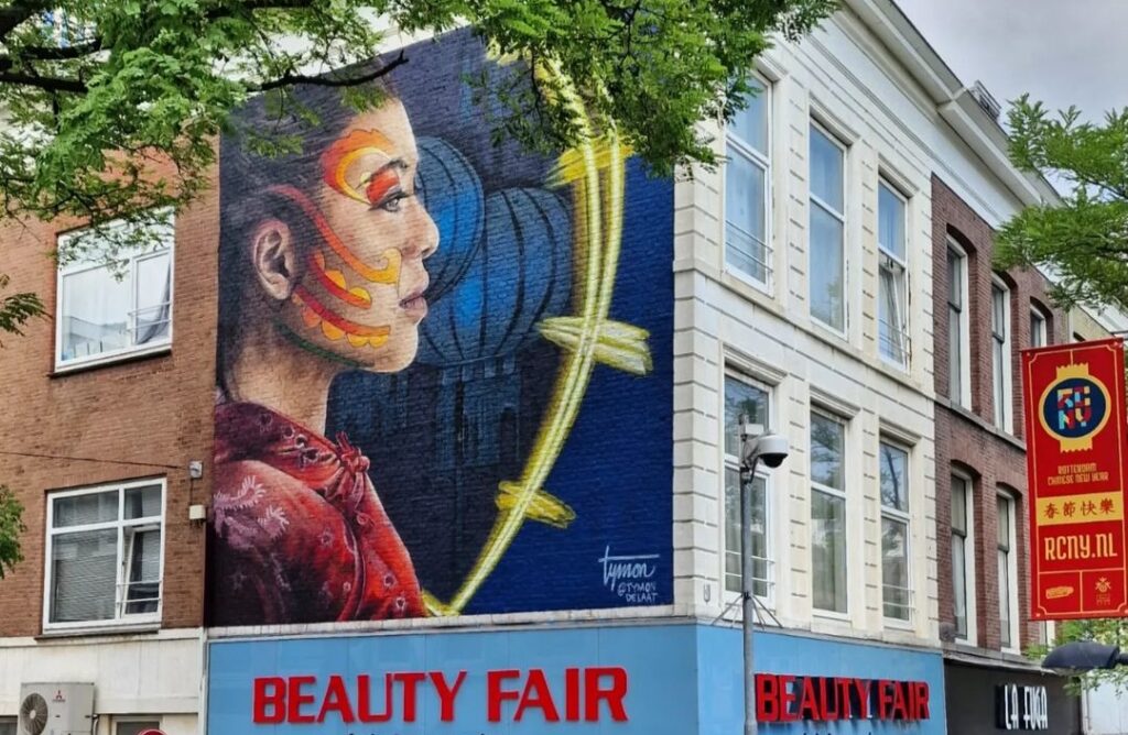 Dit betekent de nieuwe muurschildering op de West-Kruiskade